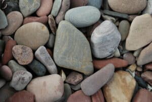 The easiest ways to remove rocks from yard areas - Kyle's Garage